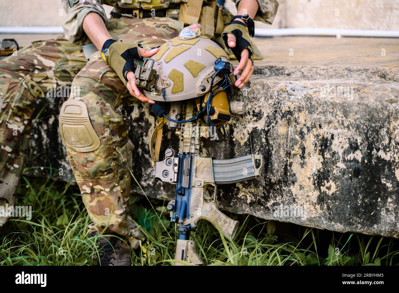 Smart teamwork of soldiers running forward and attacking enemy during ...