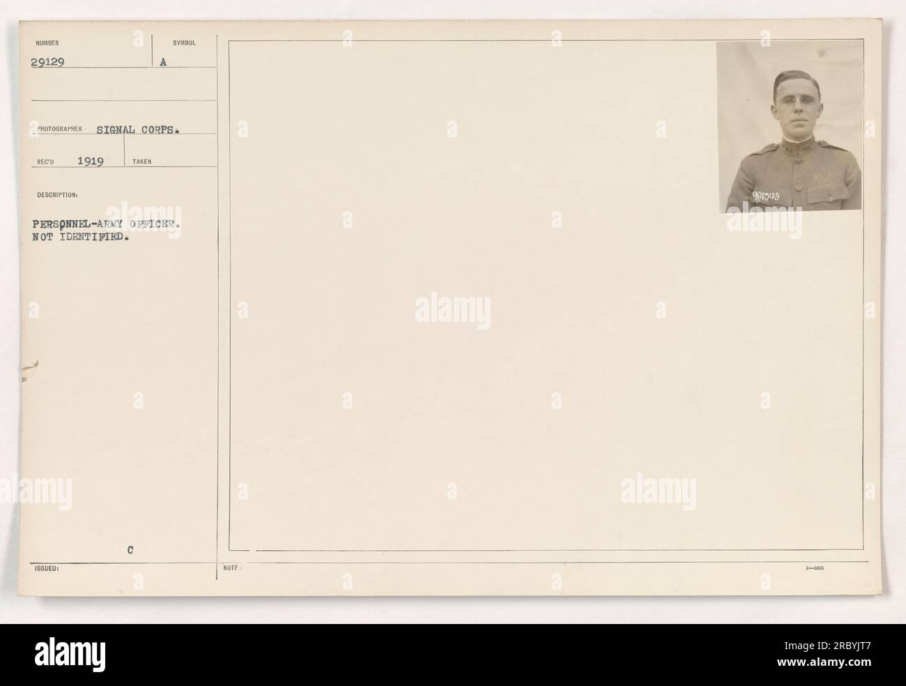 Unidentified Army officer being photographed and issued a symbol of ...