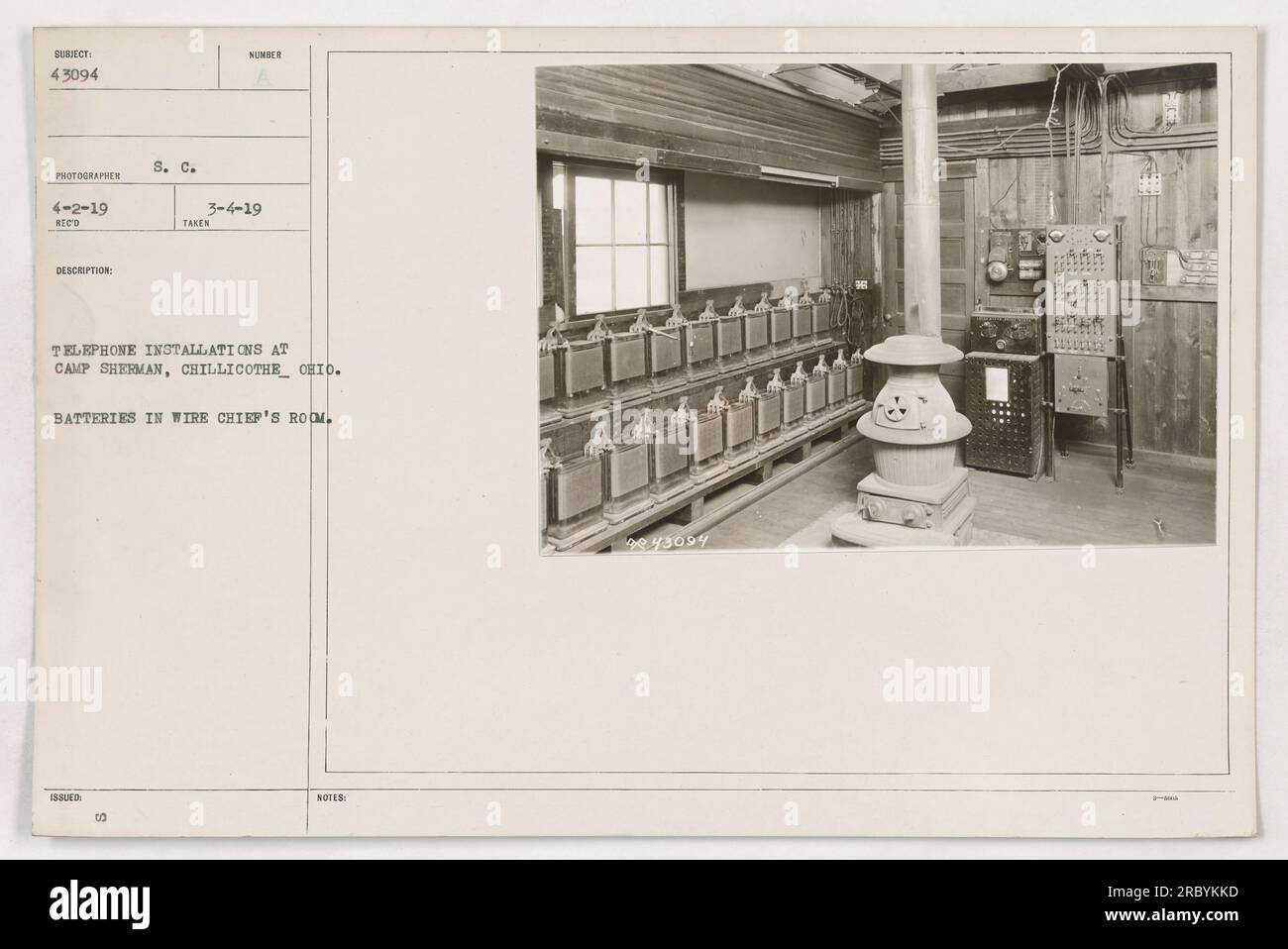 This photograph shows a view of the telephone installations at Camp ...