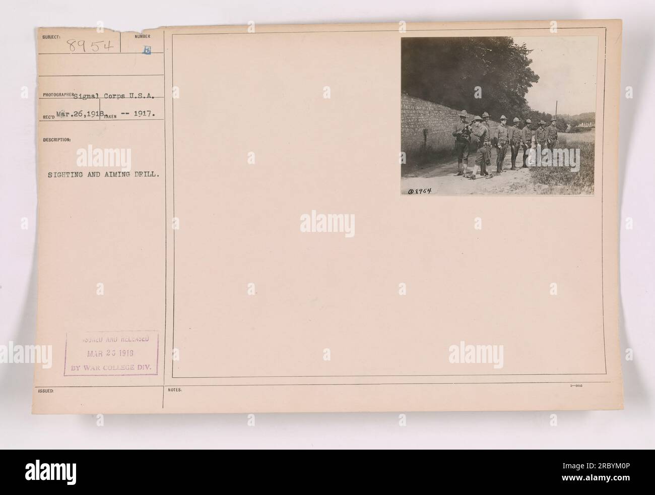 Soldiers participating in a sighting and aiming drill during World War One. The photo was taken ...