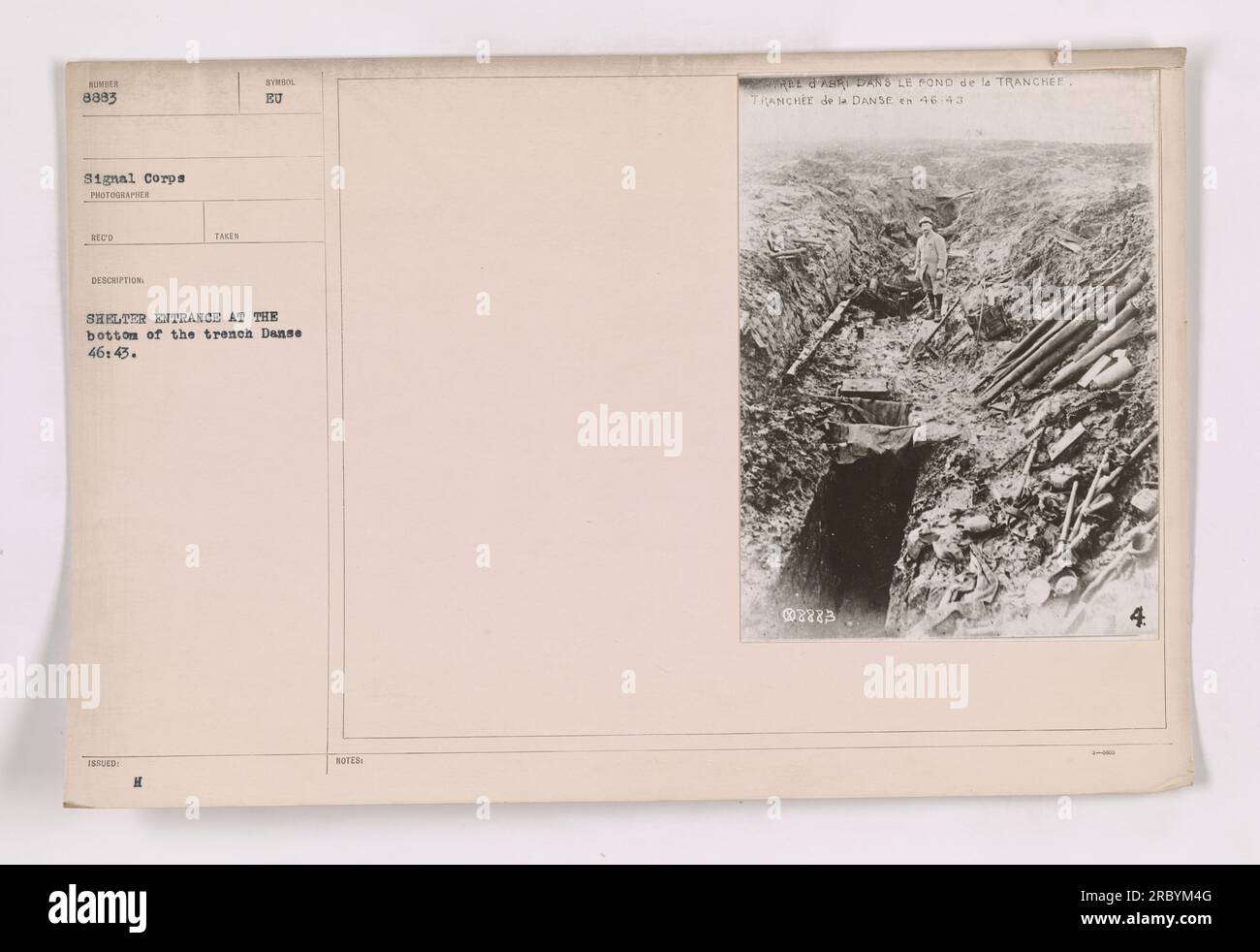 Soldiers taking cover in a trench during World War I. The photograph ...