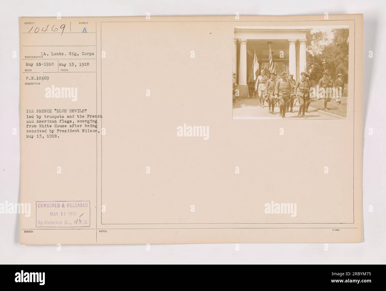 "The French 'Blue Devils' led by trumpets and French and American flags ...