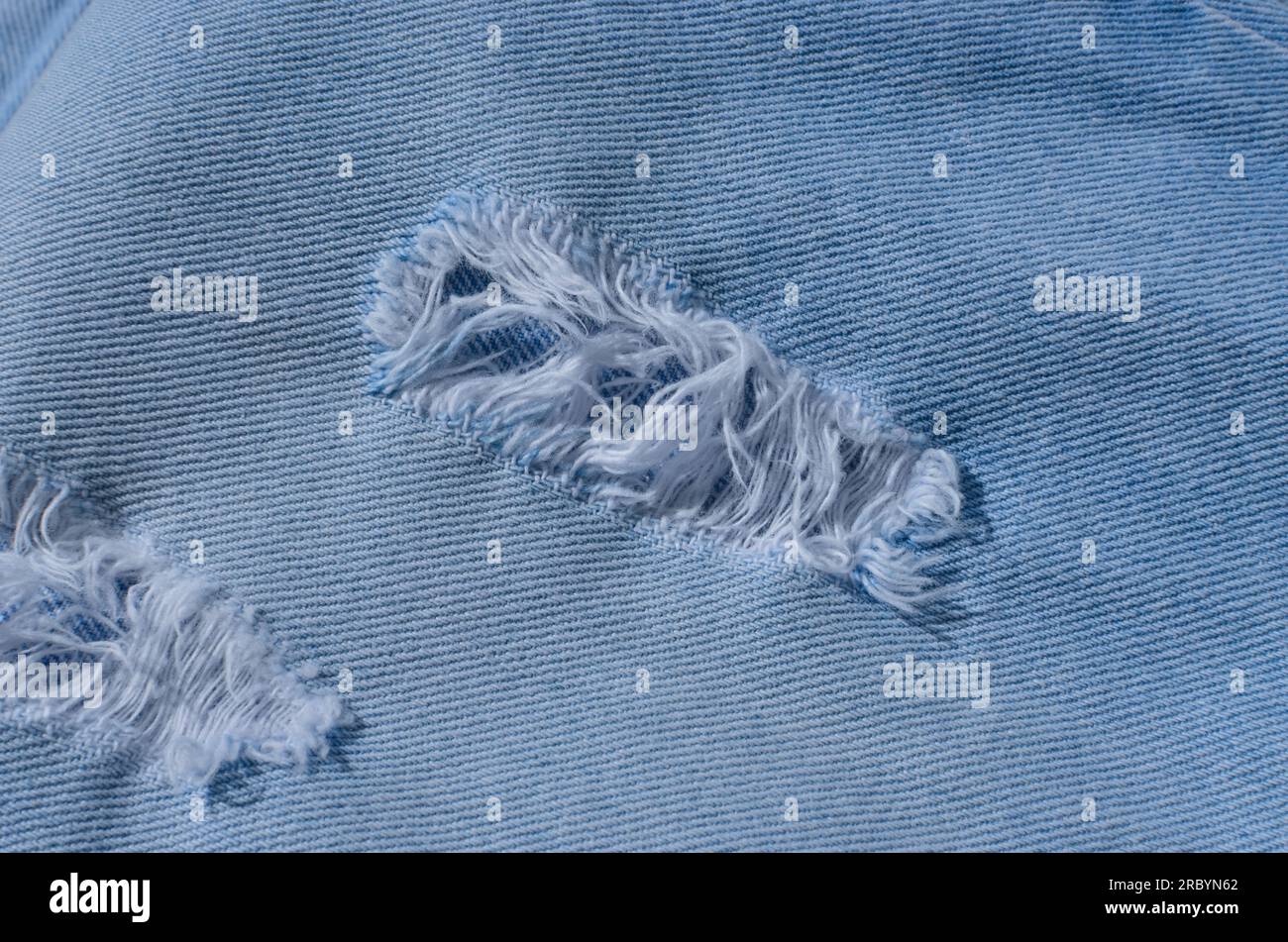 Closeup of a denim texture with intertwined lines, showing the ...