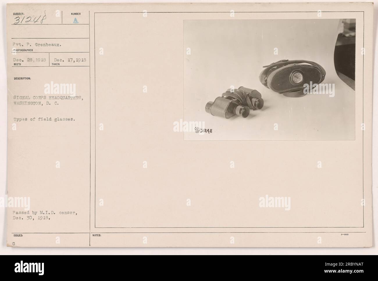 Pvt. P. Grenbeaux demonstrating different types of field glasses at ...