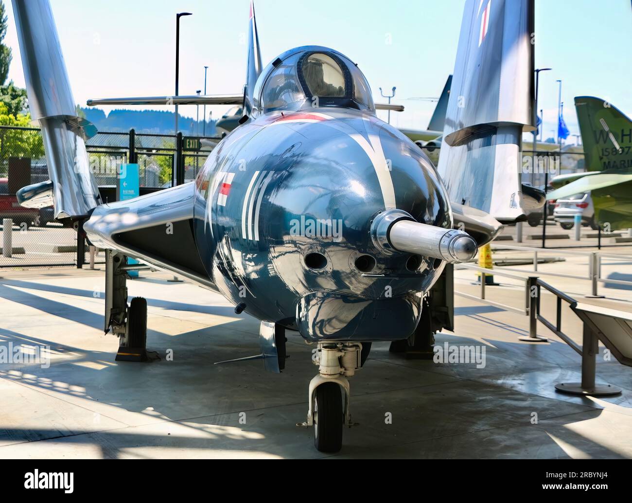 US Navy Grumman F9F-8 (F-9J) Cougar fighter plane with folded wings for aircraft carrier ...