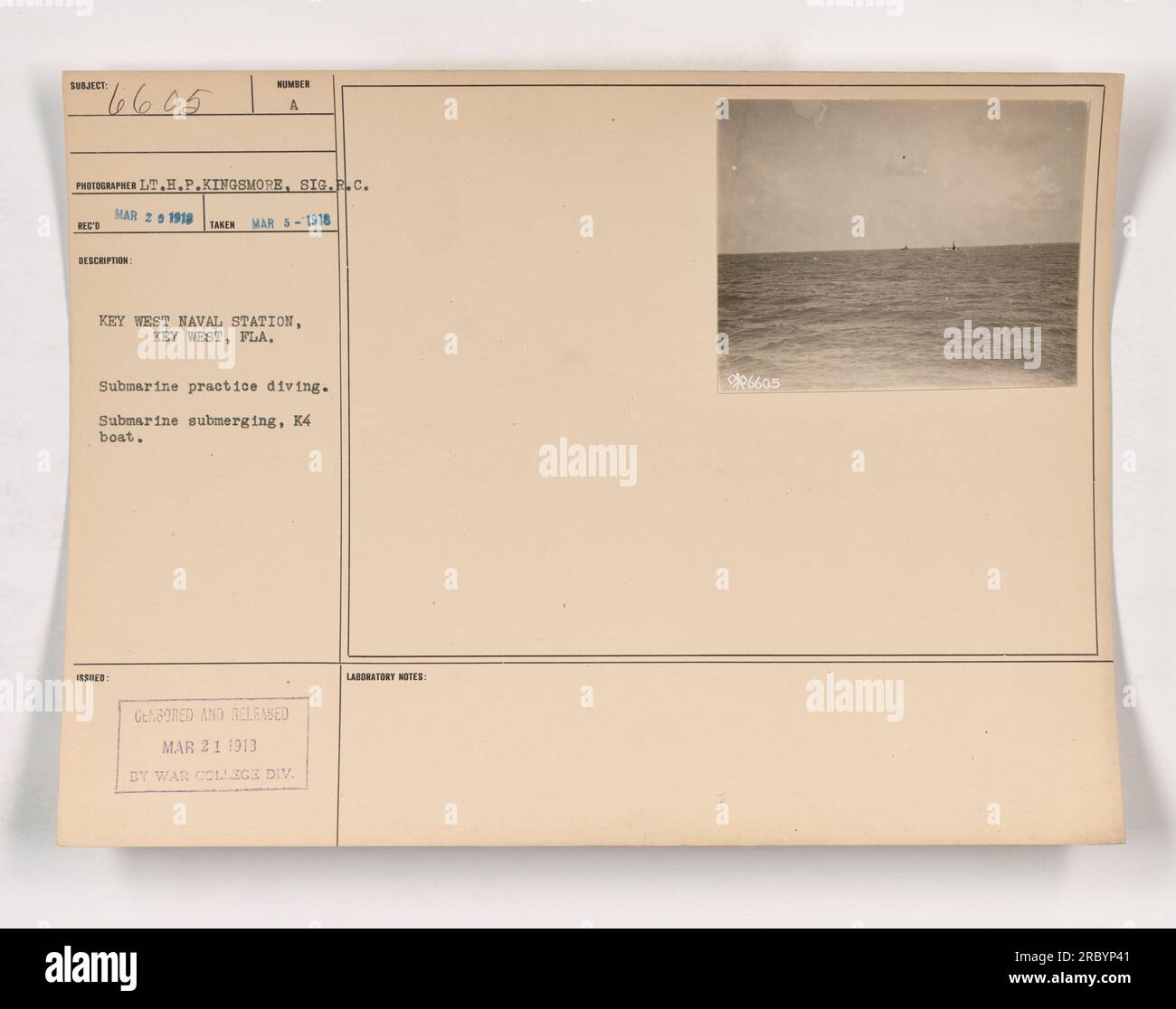 A photograph showing the K4 submarine submerging during a practice dive ...