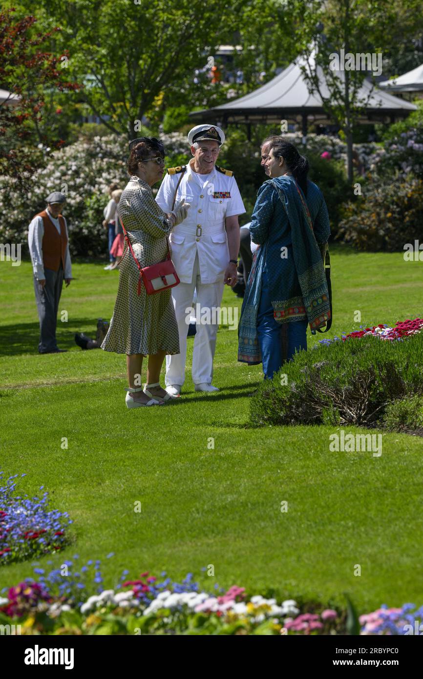 Person in 1940's fashion (officer's outfit) at nostalgic re-enactment ...