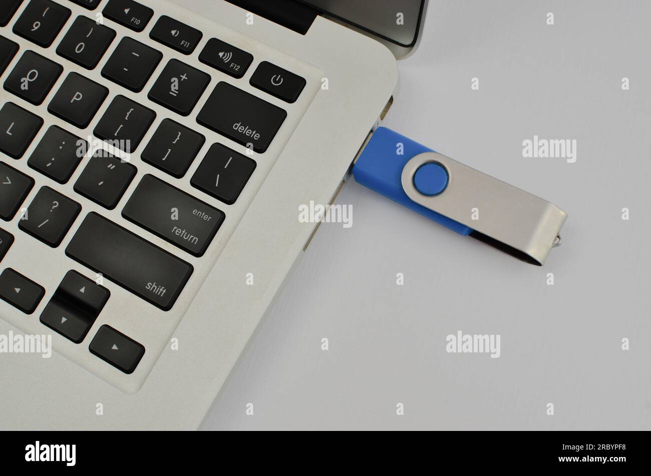 Joining forces: pendrive and laptop in perfect harmony, representing ...