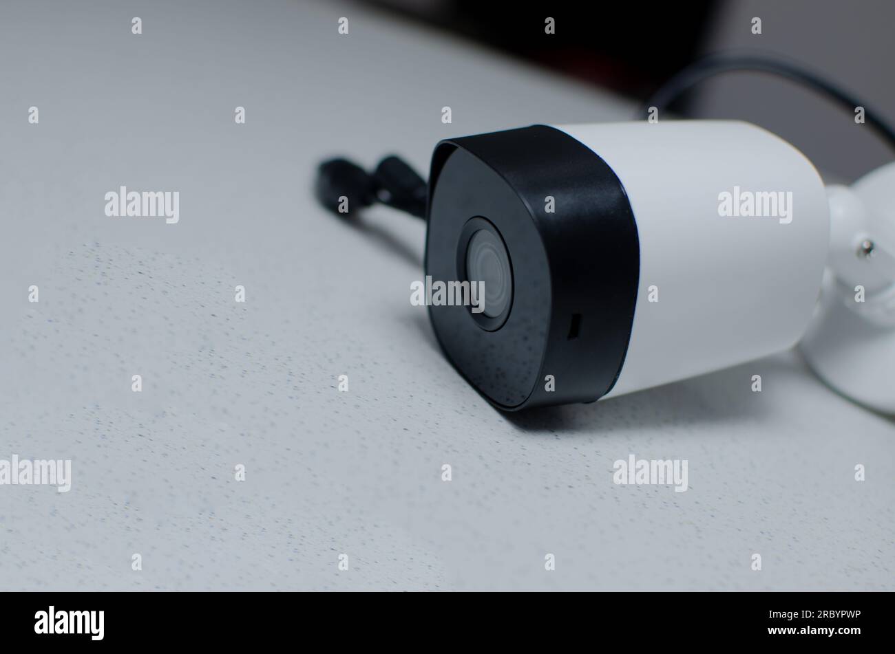 Detail of a dirty and poorly maintained security camera, highlighting ...