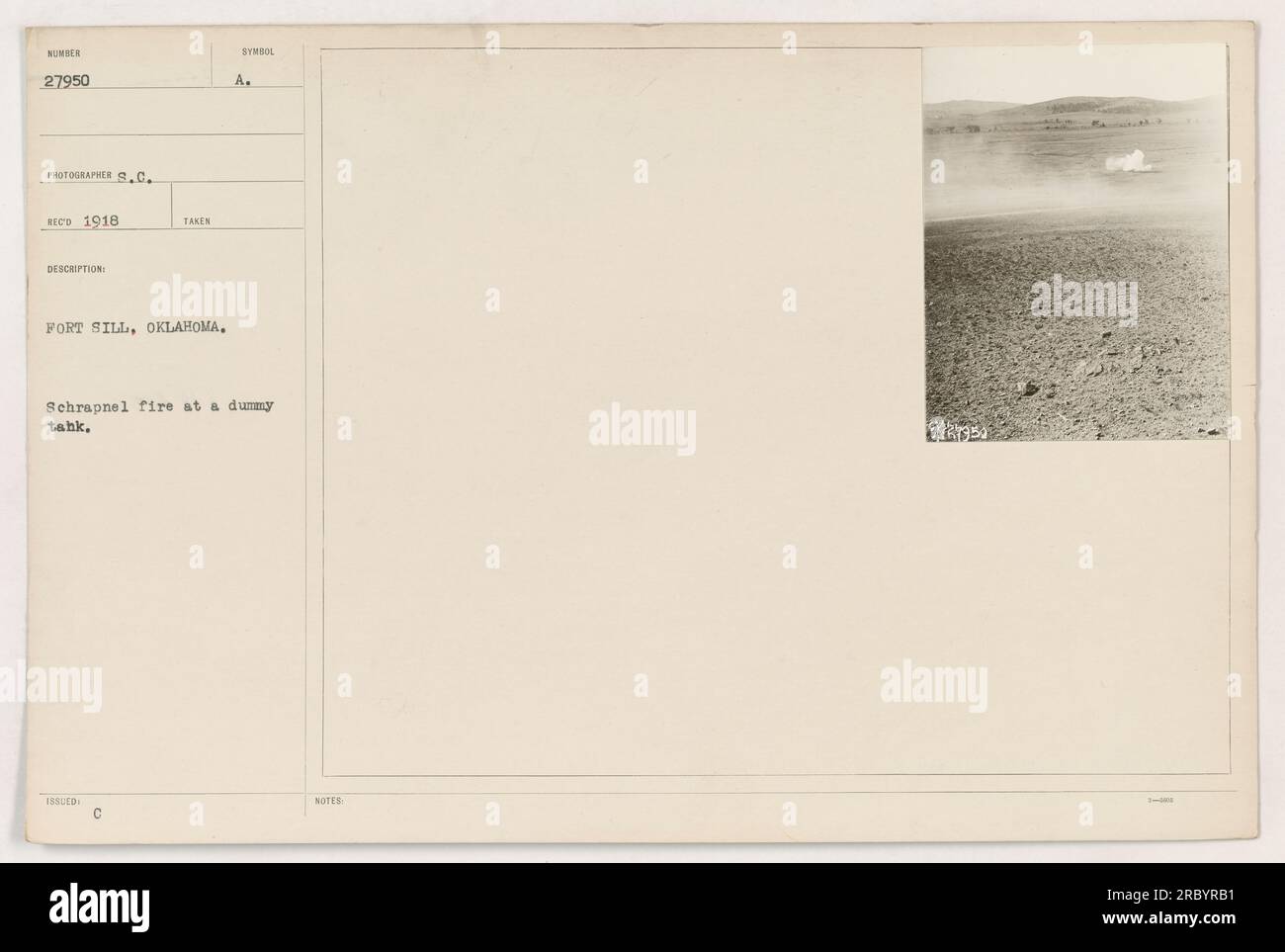 This image depicts live shrapnel fire targeting a dummy tank during ...