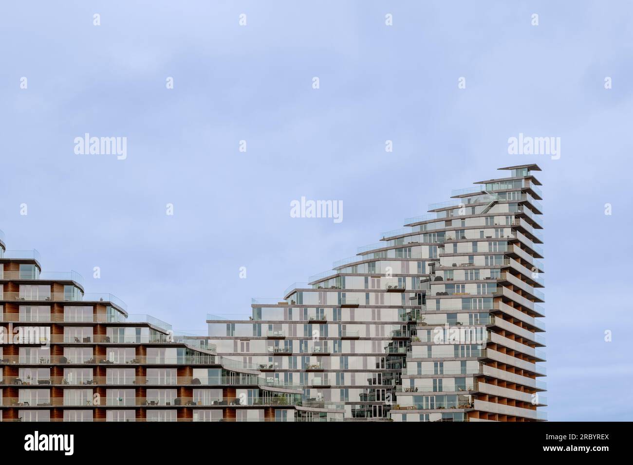 Low angel perspective view of minimal modern skyscraper with horizontal ...