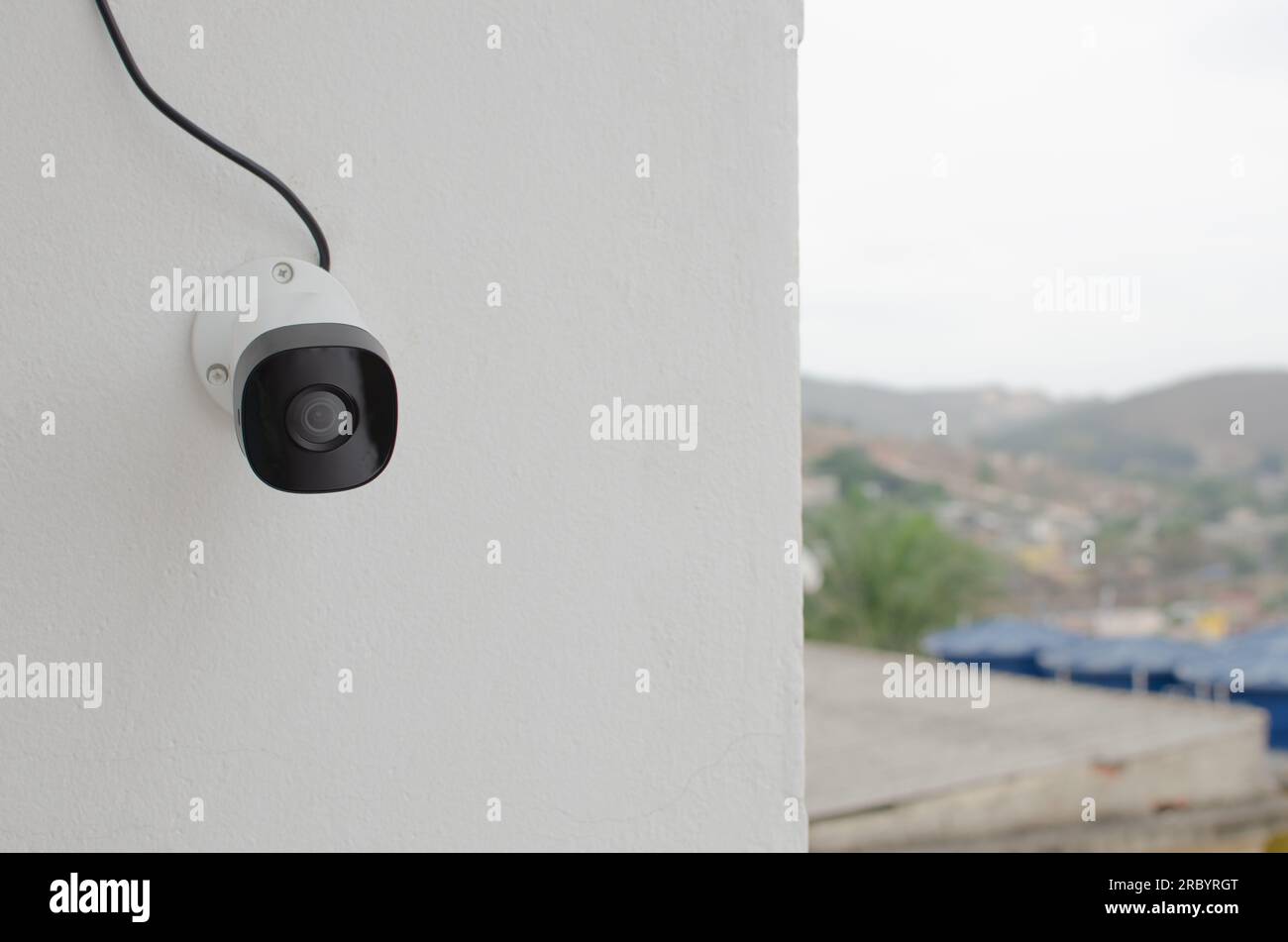 Security camera positioned on the porch, keeping an eye out for any ...