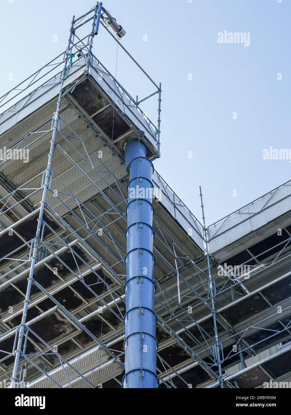 Blue temporary portable plastic construction debris pipe and ...