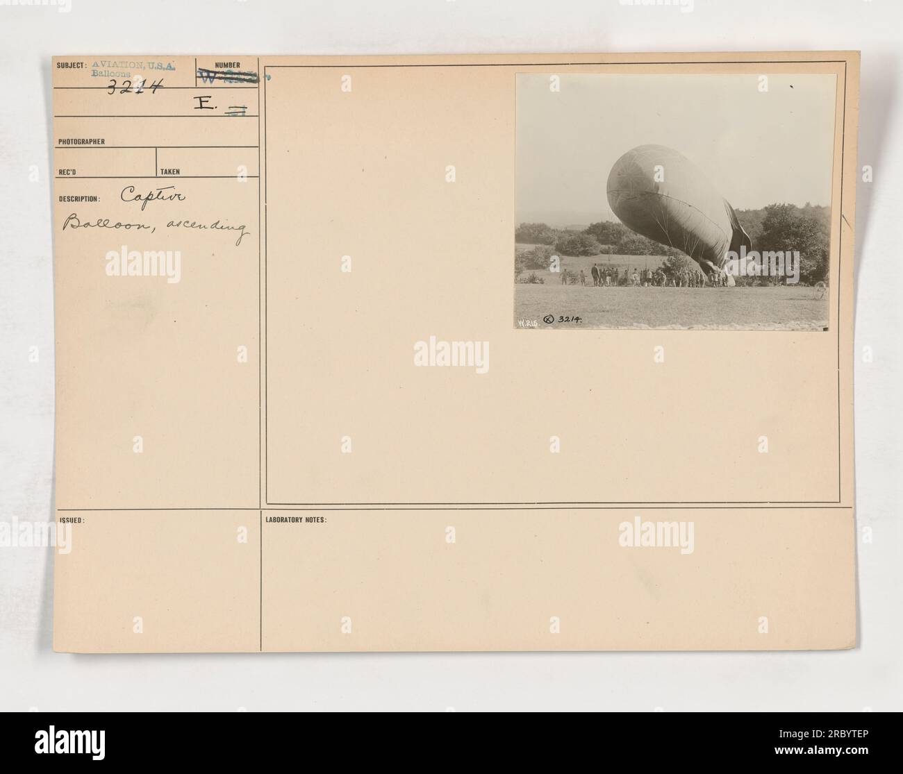 This photograph, 111-SC-3214, captures a captive balloon ascending into ...