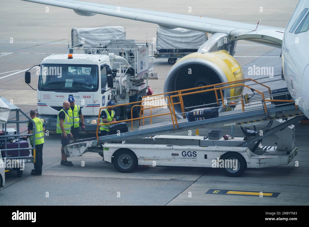 Gatwick airport baggage handlers Stock Photo - Alamy