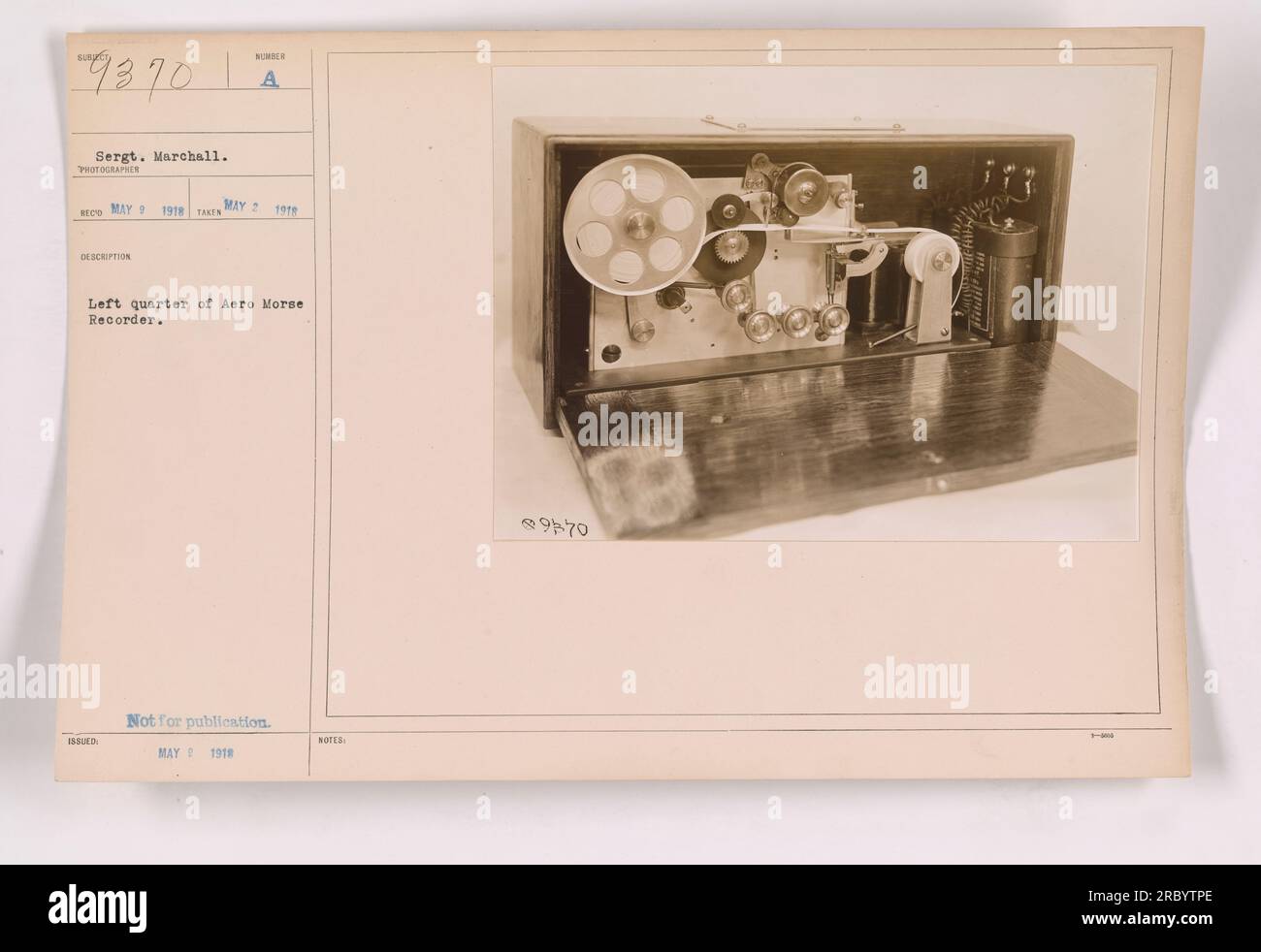 "Photograph of Sgt. Marchall operating the Aero Morse recorder during ...