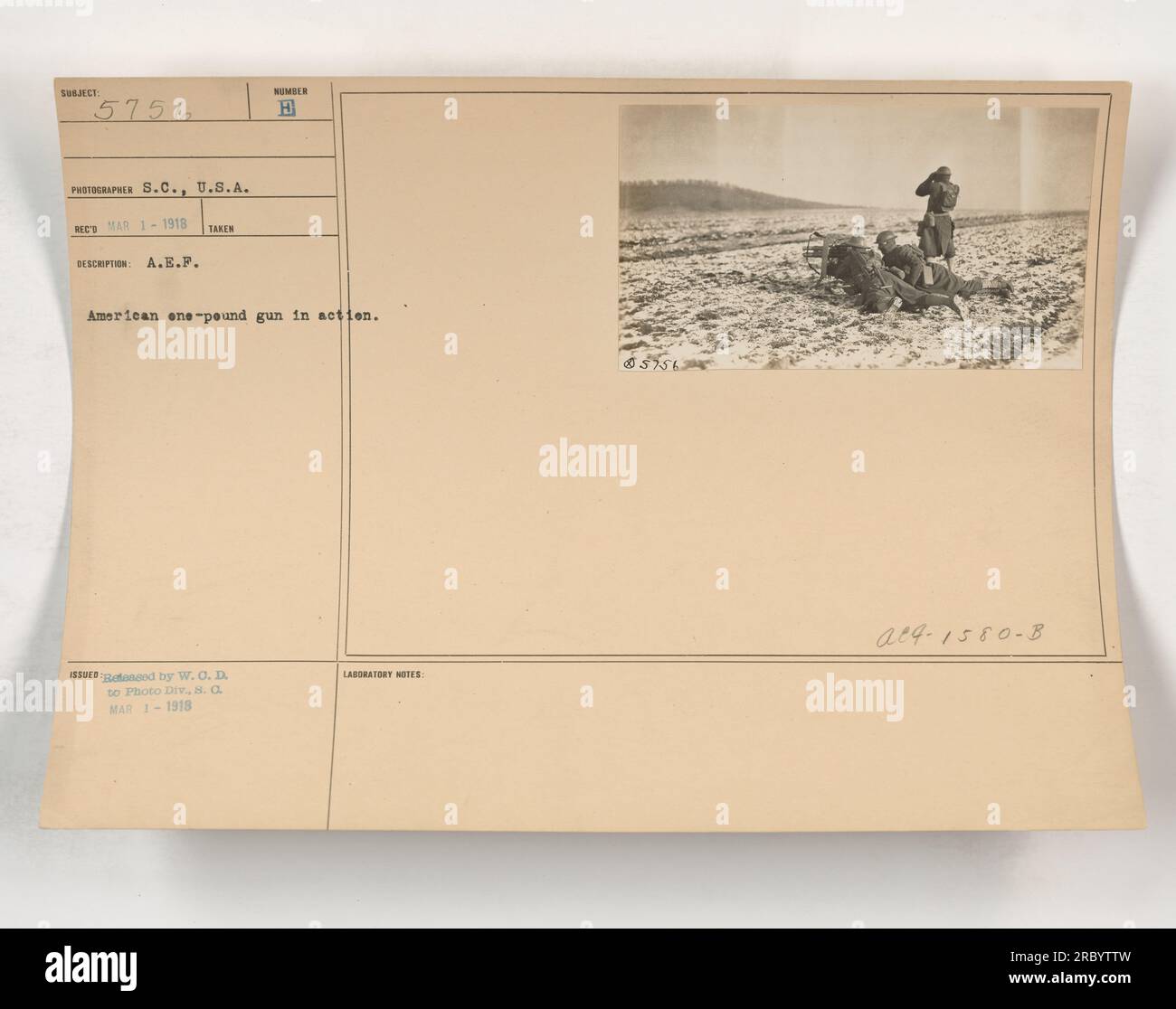 This photograph showcases an American one-pound gun in action during ...