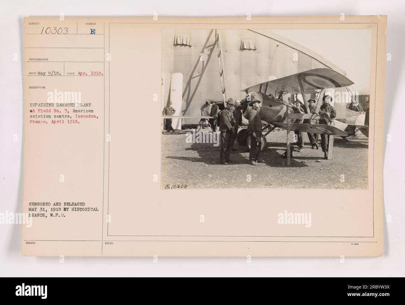 Image depicts American soldiers repairing a damaged plane at Field No ...