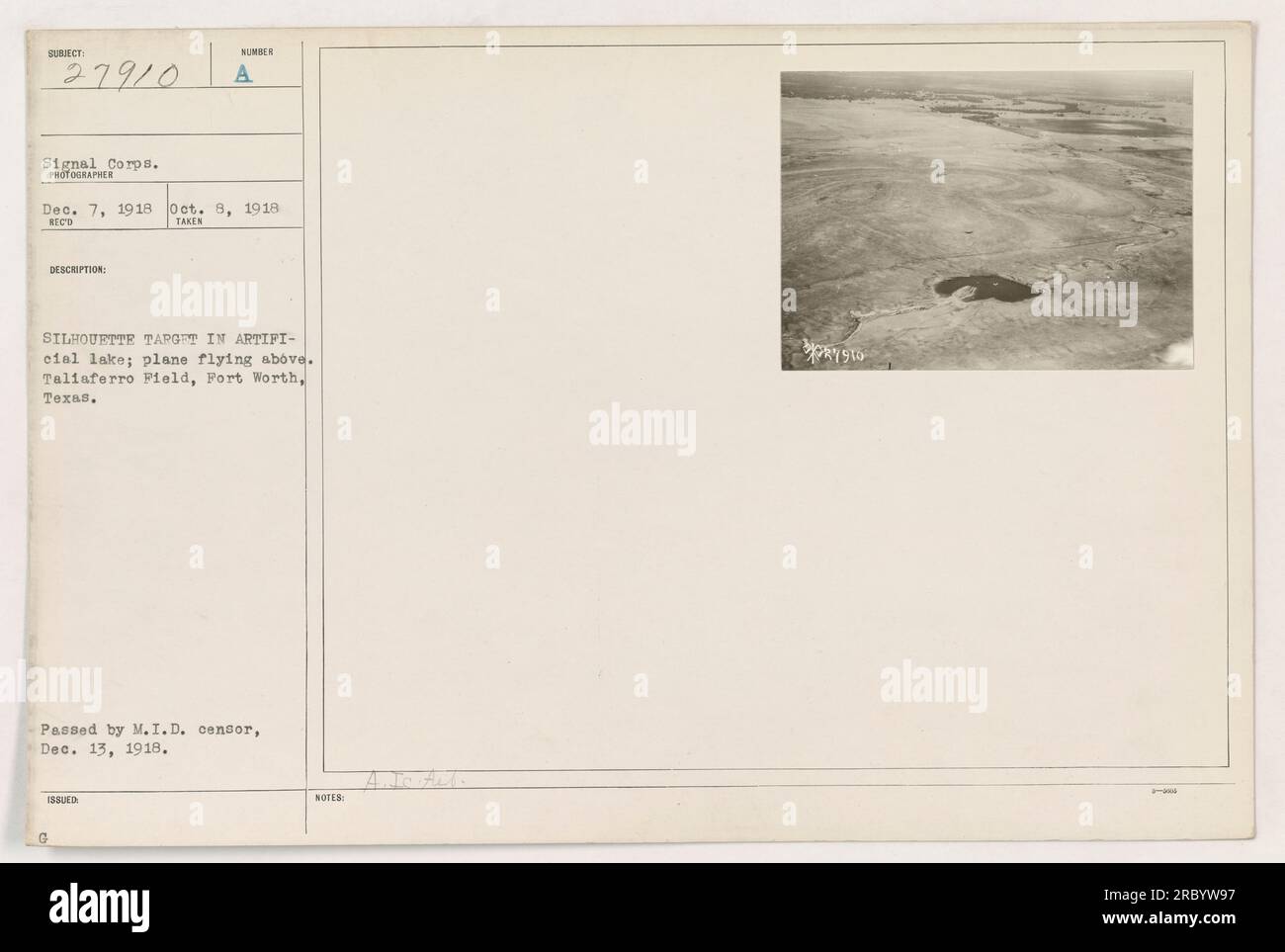 An American military plane flies over a man-made lake at Taliaferro Field in Fort Worth, Texas ...