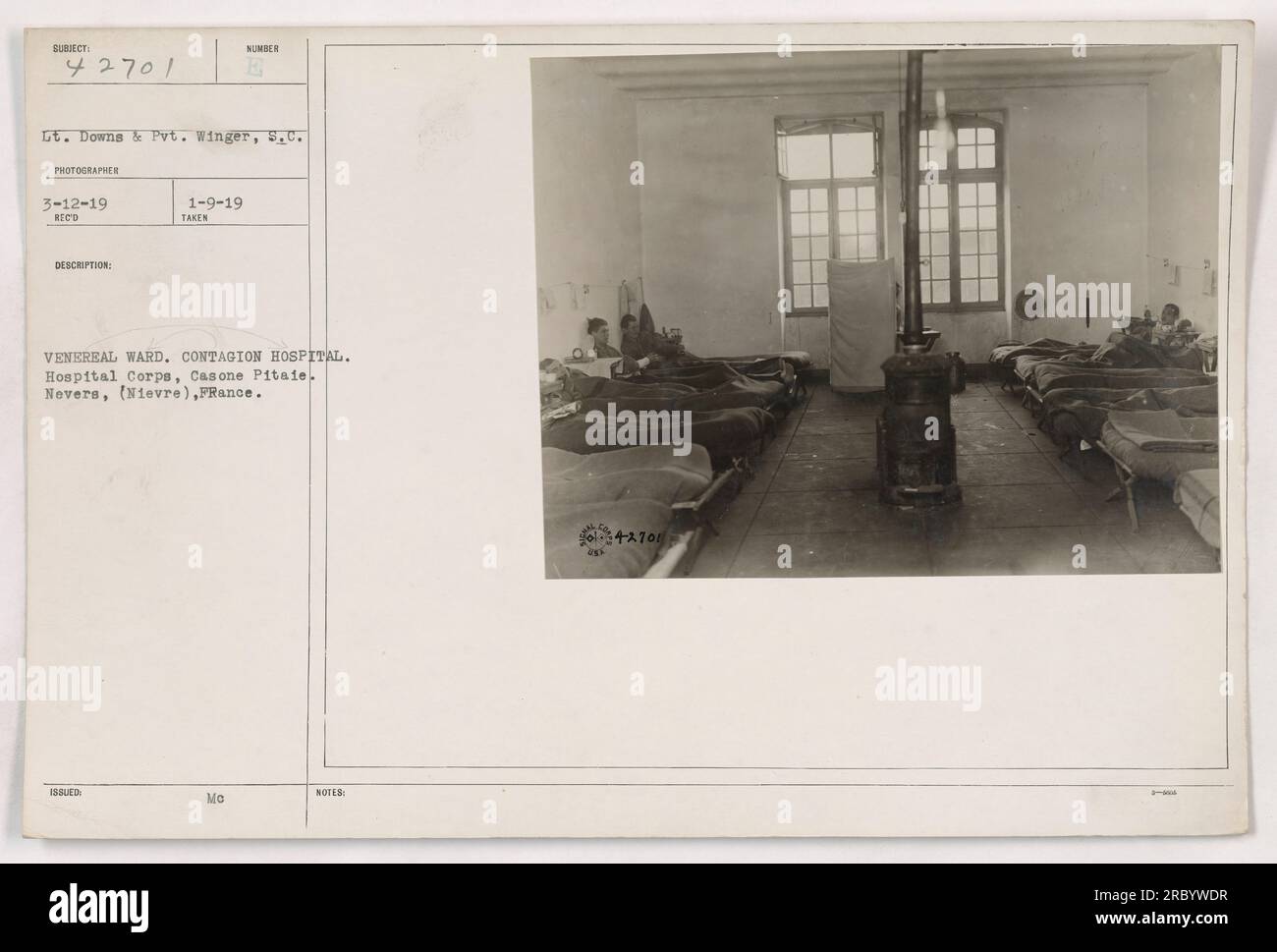 Lt. Downs and Pvt. Winger from the Hospital Corps are shown in this ...