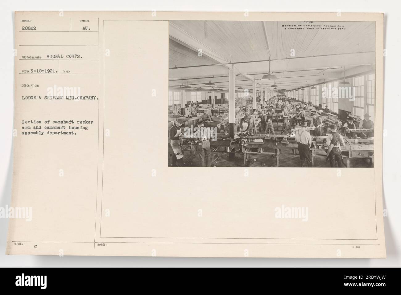Section of the camshaft rocker arm and camshaft housing assembly ...