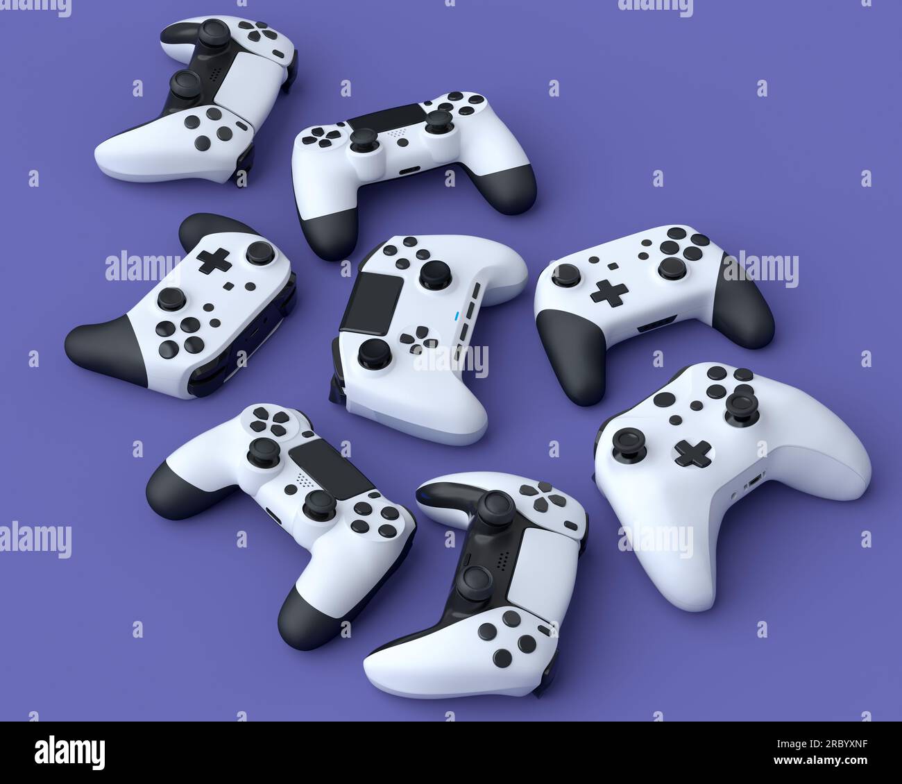 Set of lying gamer joysticks or gamepads on purple background with blur ...