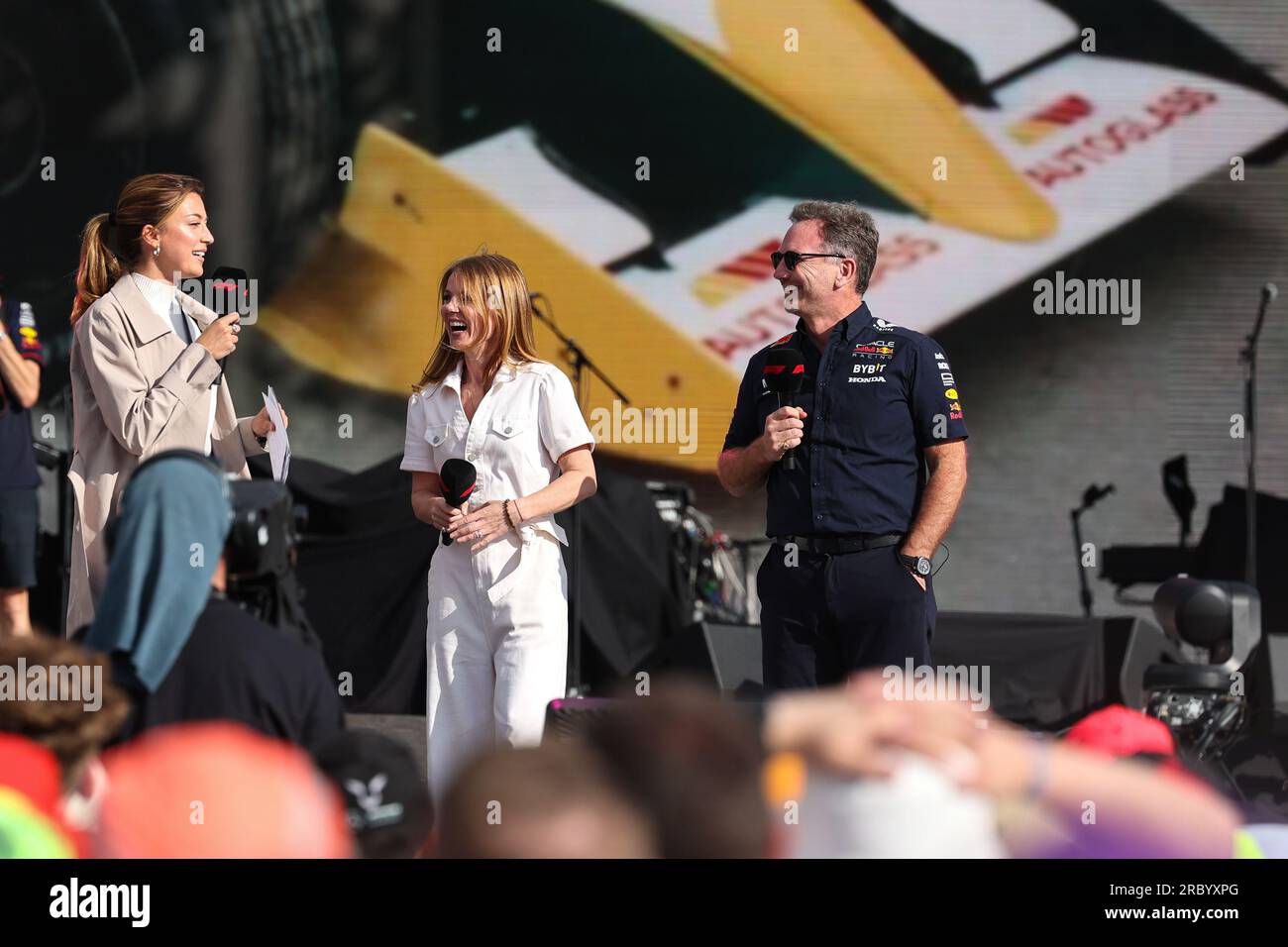 Geri Halliwell in stage being interviewed after the race on stage and ...