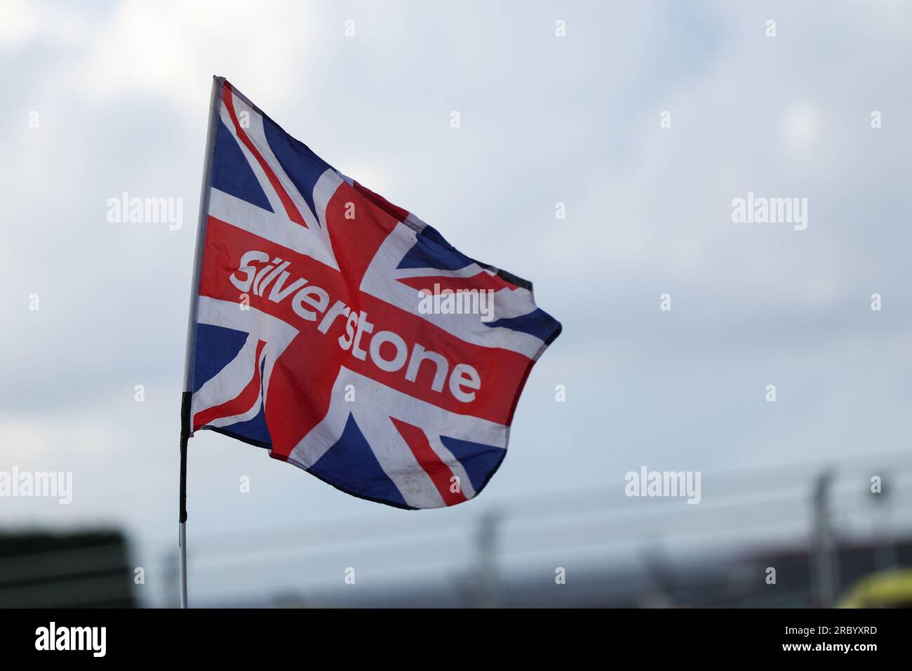 A British Union Jack flag with Silverstone on it is hoisted above the ...