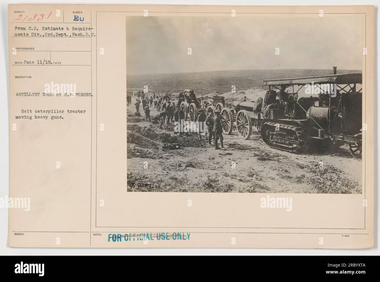A Holt caterpillar tractor moves heavy artillery guns as part of the ...