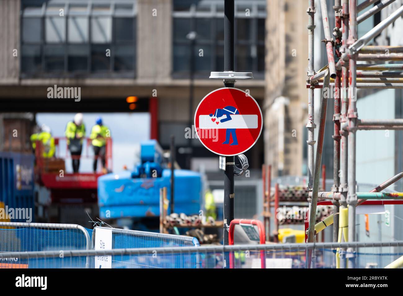 Hacked street sign hi-res stock photography and images - Alamy