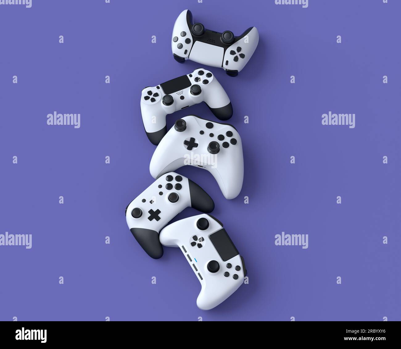 Set of lying gamer joysticks or gamepads on purple background with blur ...