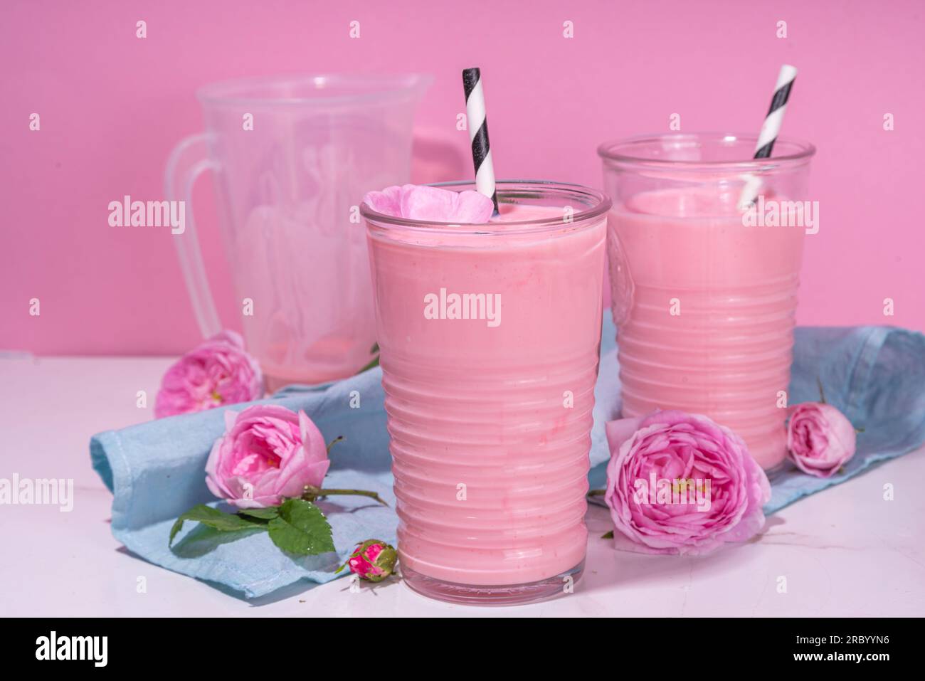 Rose flower milkshake, asian Moon milk drink. Pink matcha cocktail with ...