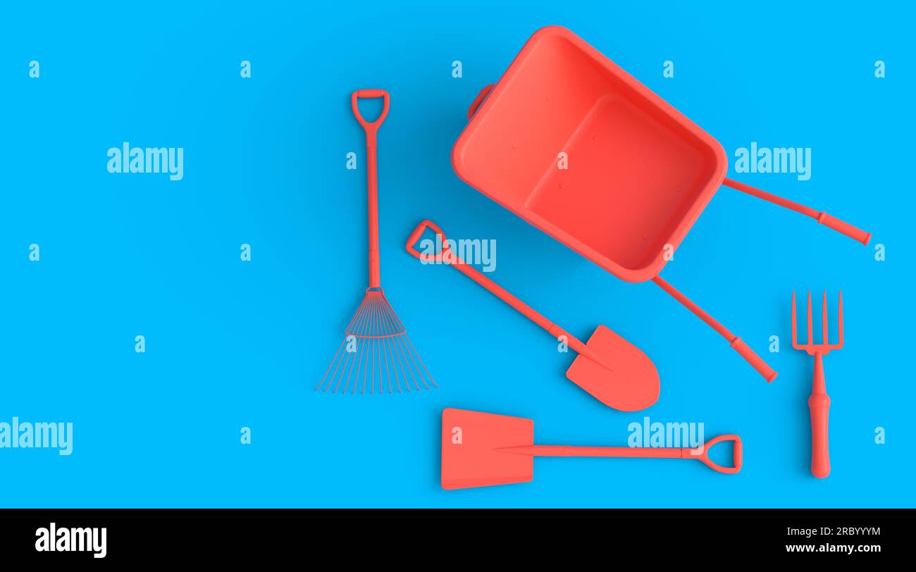 Garden wheelbarrow with garden tools like shovel, rake and fork on ...