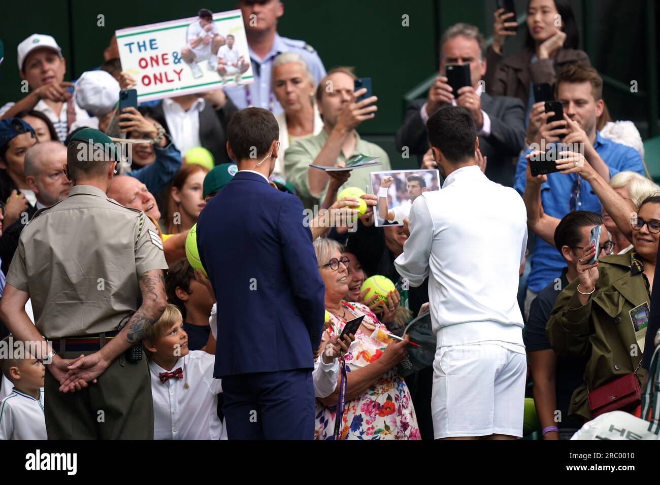 Novak Djokovic signs autographs for fans following victory over Andrey ...