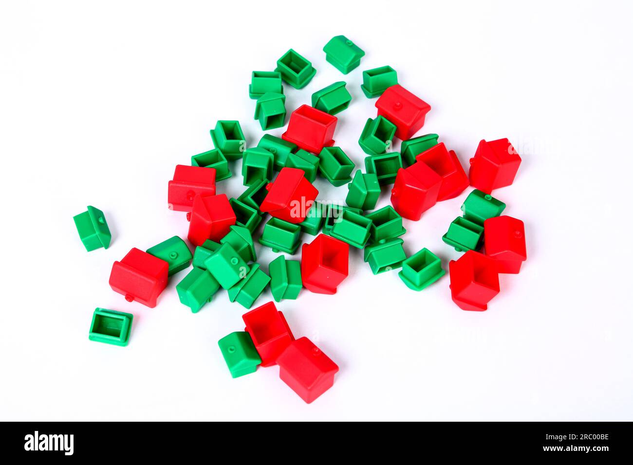 Monopoly houses and hotels, building or mortgage concept Stock Photo ...