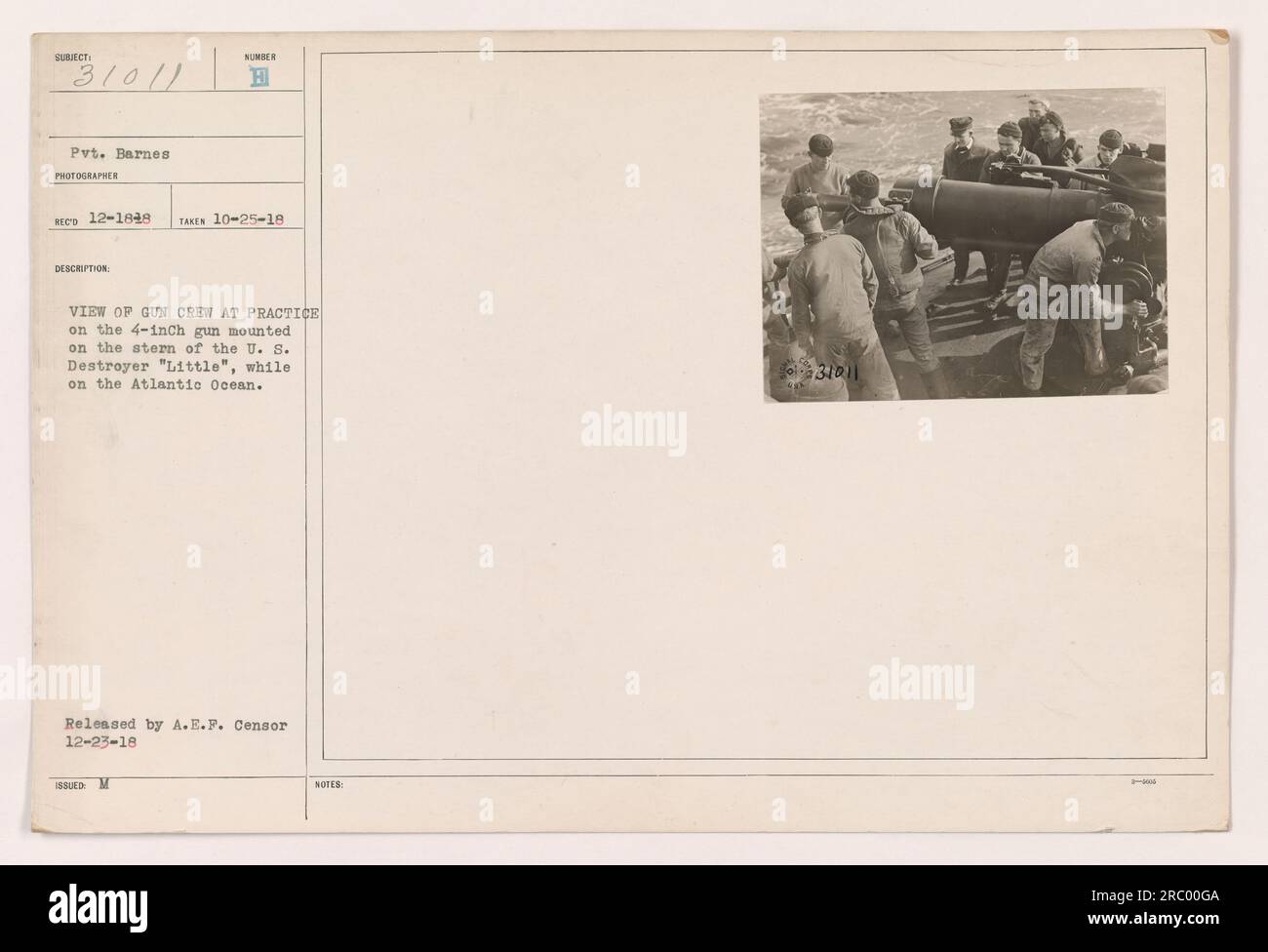 Private Barnes captures a view of a gun crew practicing on the 4-inch ...
