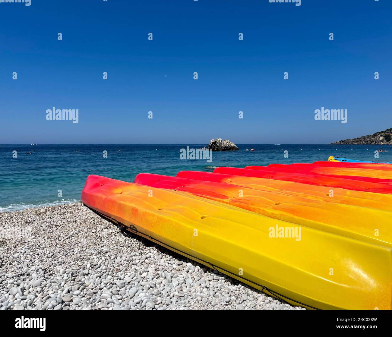 Kayaking on the Beach Concept Photo. Sport Kayak on the Rocky Beach ...