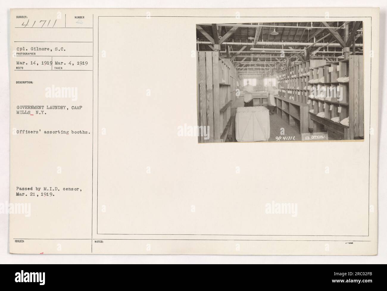 Officers at a government laundry facility in Camp Mills, New York ...