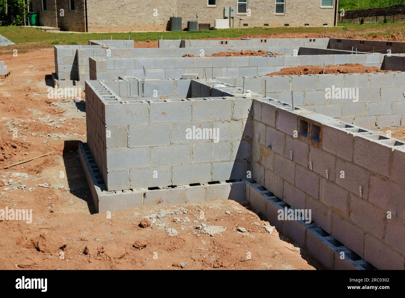 Near house there is masonry building with foundation walls that are ...