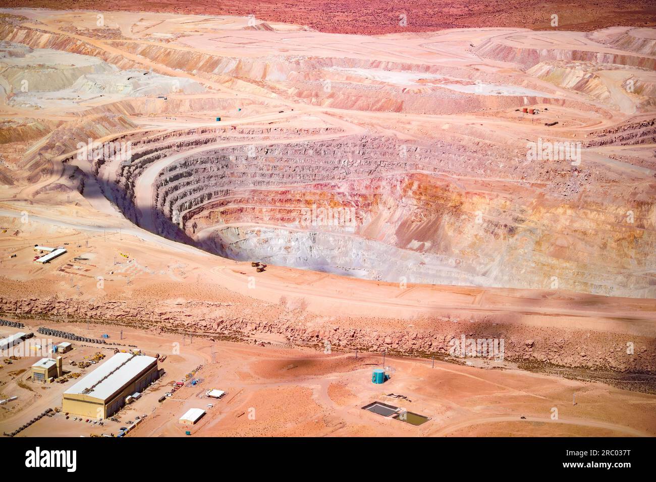 Close-up aerial view of the pit of a copper mine at the altiplano of ...