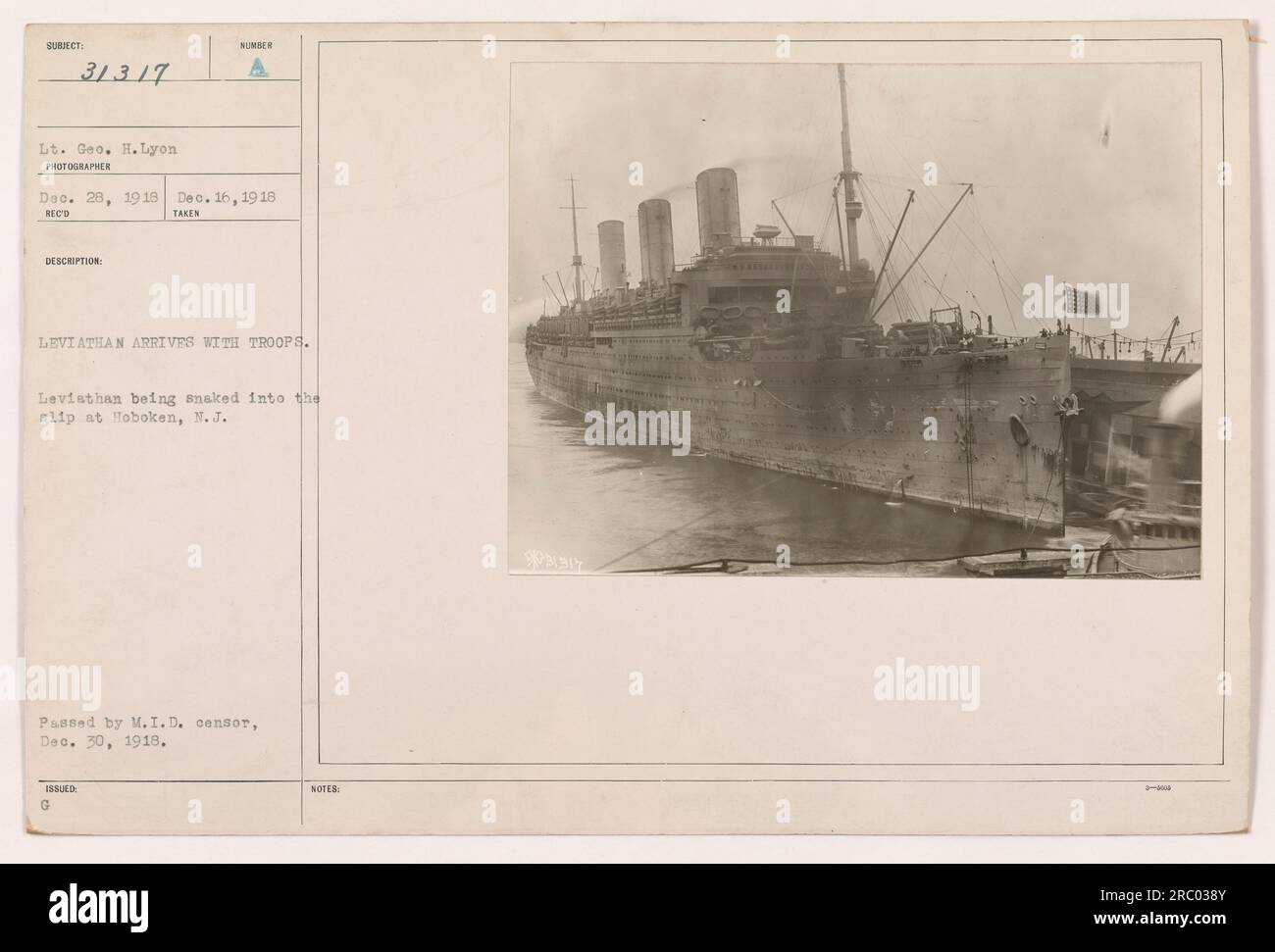 This photograph depicts the arrival of the Leviathan, a ship carrying ...