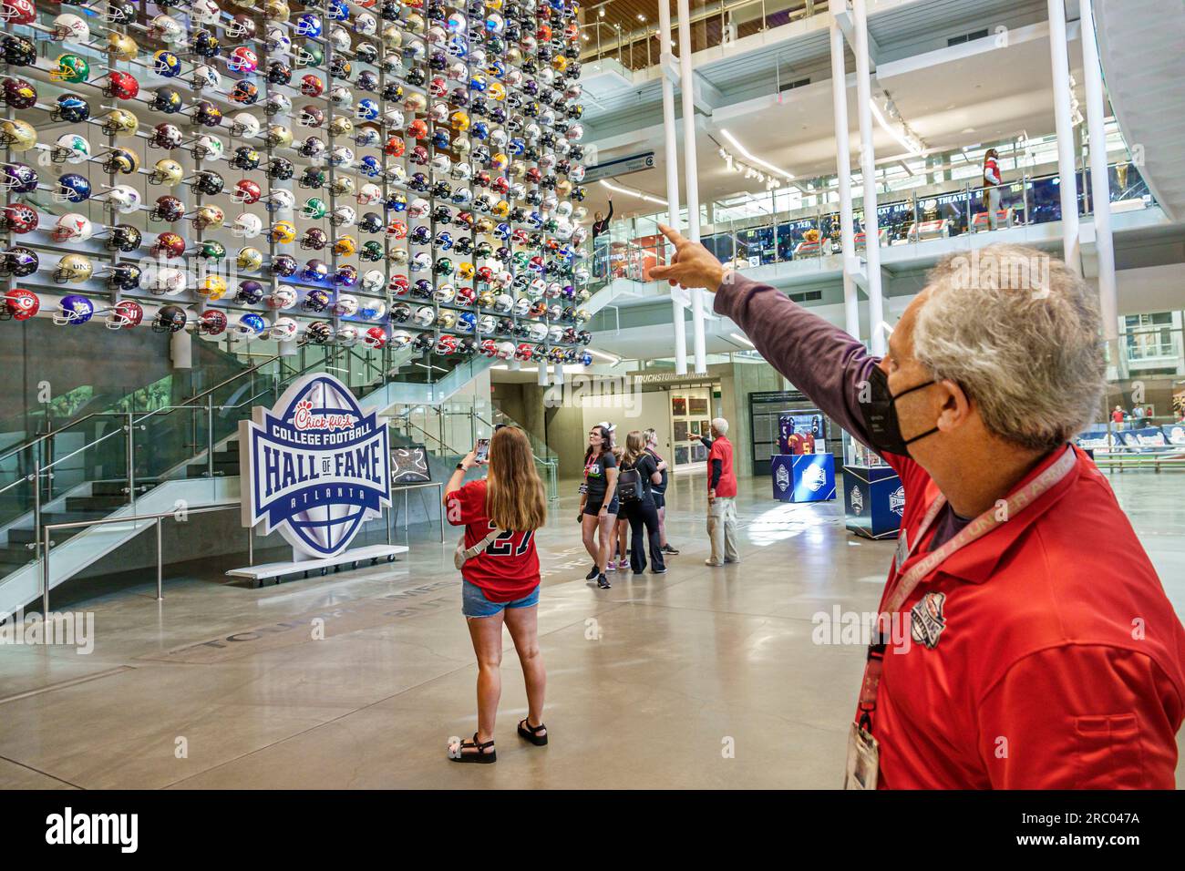 Atlanta Georgia,College Football Hall of Fame,helmet collection exhibit,guide senior man,inside ...