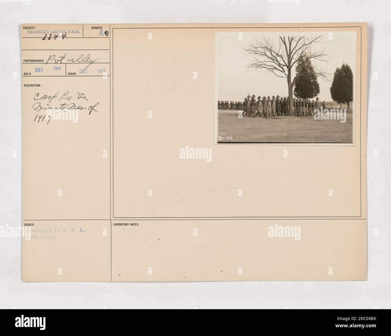 Soldiers participating in a shooting range activity known as "Pot Alley" at Camp Lee, Virginia ...