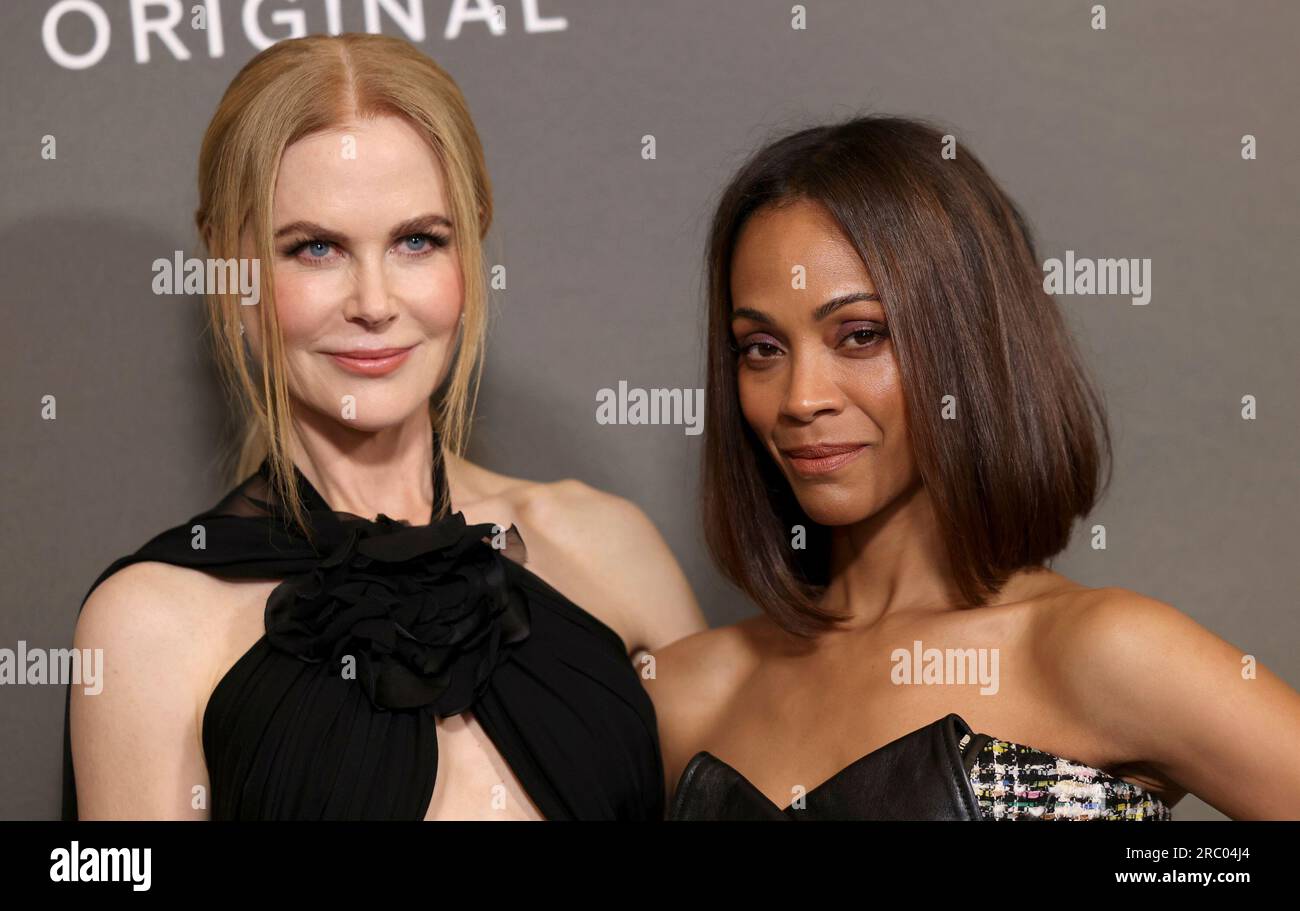 Nicole Kidman, left, and Zoe Saldana pose for photographers upon ...
