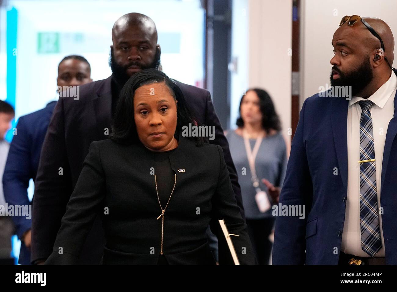 Fulton County District Attorney Fani Willis, center, arrives to the ...