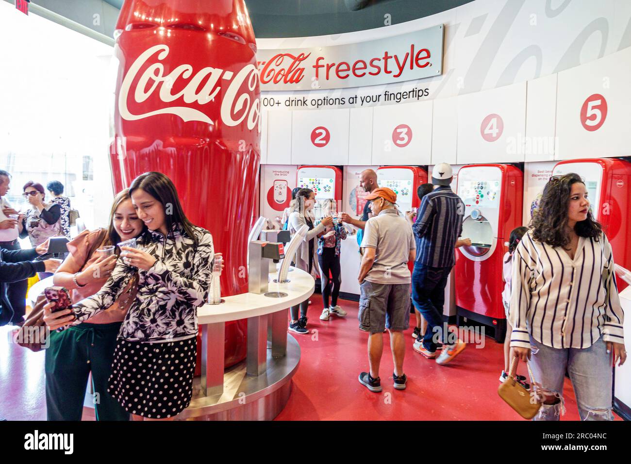 Atlanta Georgia,World of Coca-Cola exhibit,inside interior,teen girls ...