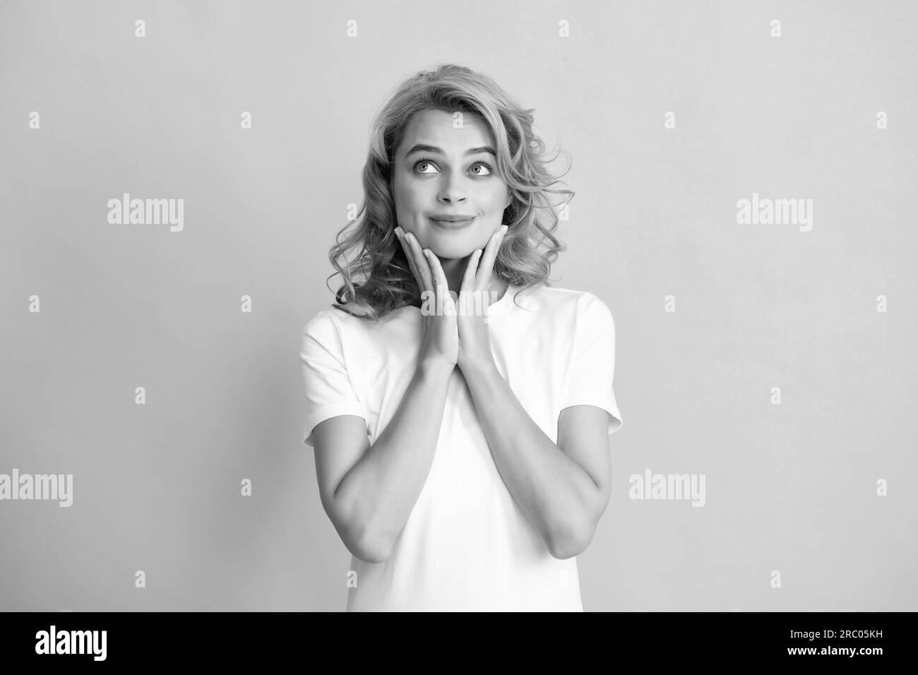 Surprised astonished young woman with open mouth. Female model face ...