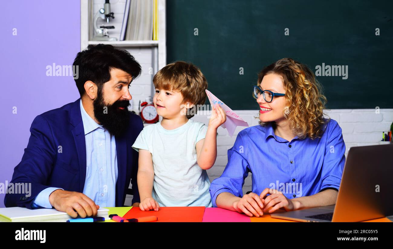 Little school kid at lesson. Homeschooling. Beginning of lessons ...