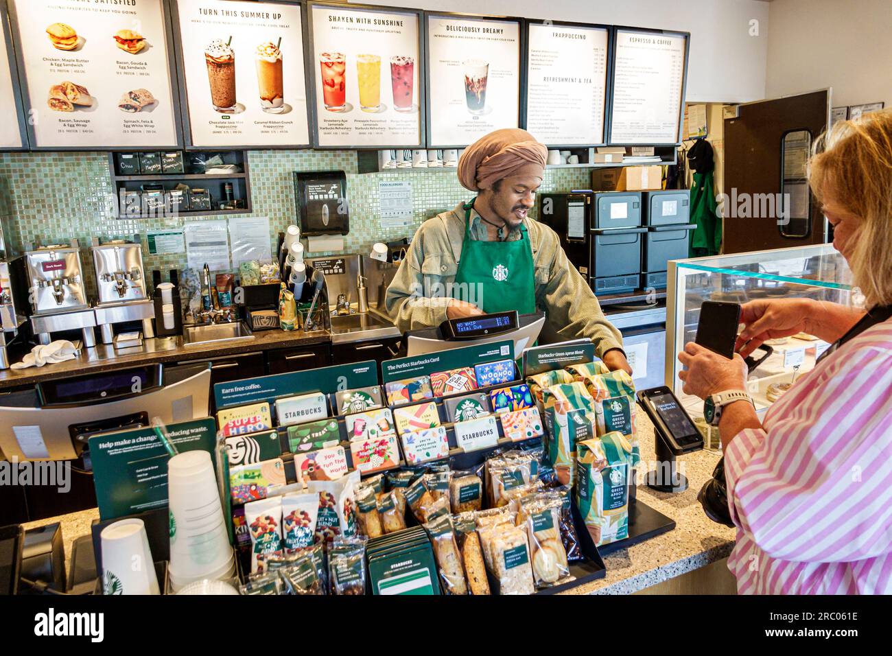 Starbucks customer worker hi-res stock photography and images - Alamy