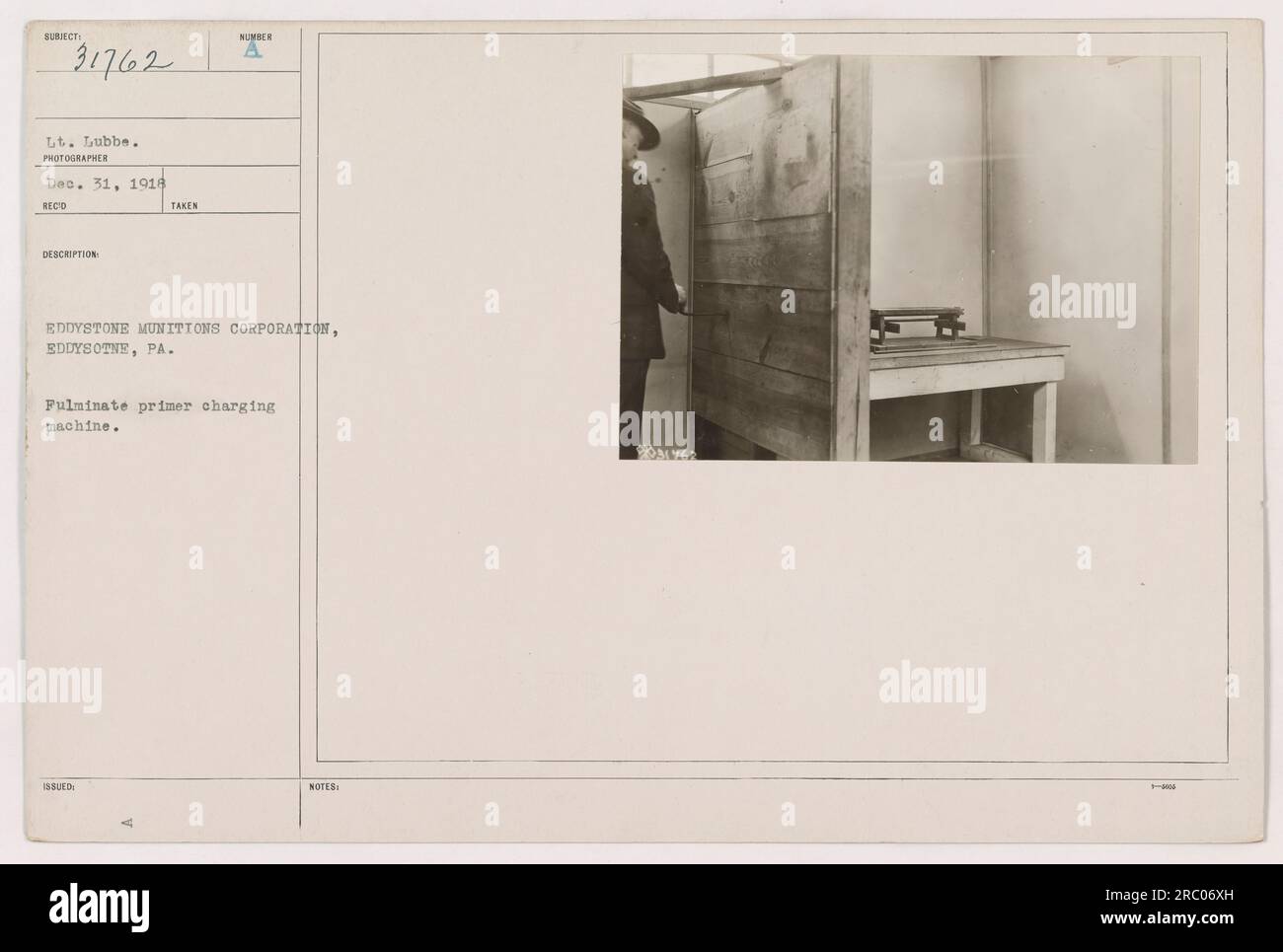 Lt. Lubbe operates a fulminate primer charging machine at the Eddystone ...